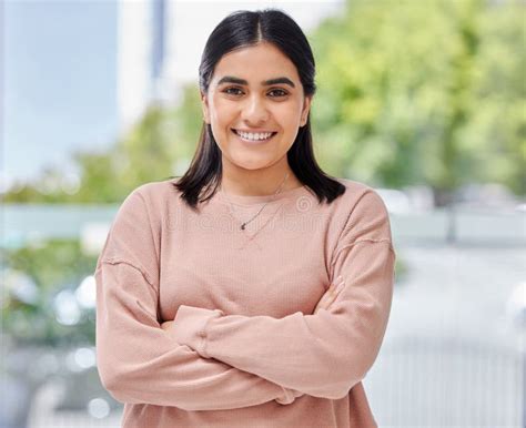 Smile Portrait And Face Of A Young Woman At Home With Arms Crossed
