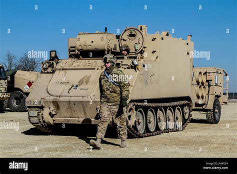 Us Soldiers Offload An M577 Armored Vehicle At The Mihail