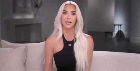 Kim Kardashian Sits In Raunchy Pose Pushing Canned Drinks