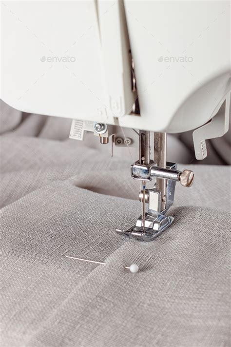 Modern Sewing Machine Presser Foot With Linen Fabric And Thread