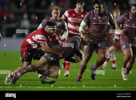 Munster Rugbys Jack Crowley Is Tackled By Gloucester Rugbys Dian Bleuler During The Investec