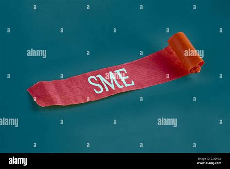 Sme Small And Medium Enterprise Sme On A Piece Of An Unfolded Note