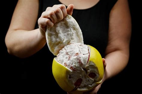 Premium Photo Pomelo Citrus Fruit With Sweet Red Flesh And Yellow