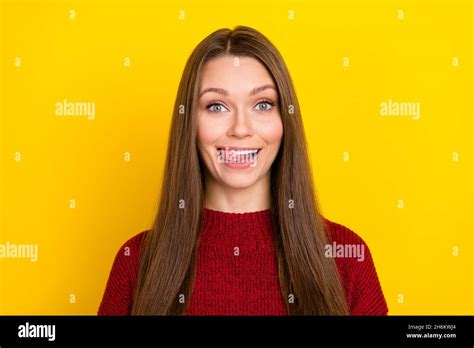 Portrait Of Attractive Funny Cheerful Long Haired Girl Licking Lip Isolated Over Vibrant Yellow