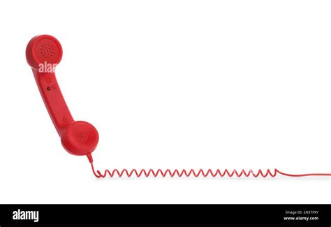 red corded telephone handset on white background hotline concept stock