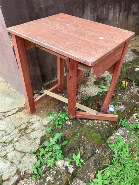 A Broken School Bench Sat Behind The School Building Stock Image