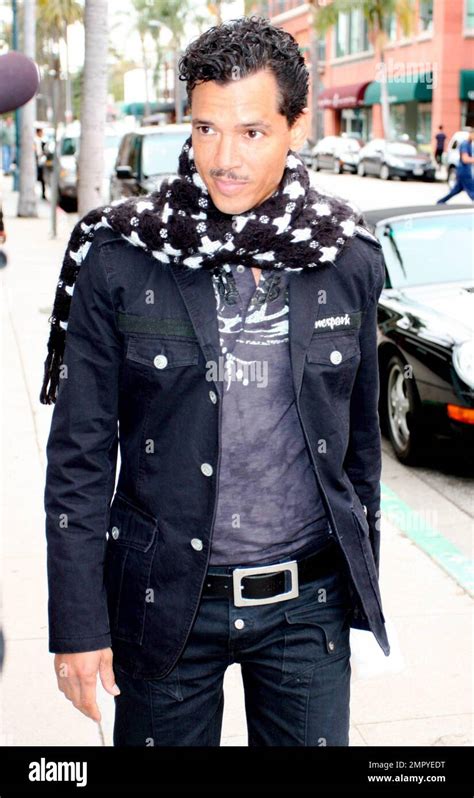 Singer El Debarge Dons A Trendy Scarf While Out With A Friend Los Angeles Ca 022310 Stock