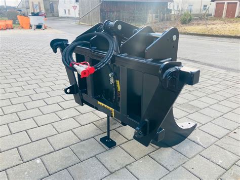 Holzgreifer Polterzange Holzzange Holzgreifer Frontlader Radlader In