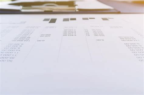 Premium Photo Close Up Of Documents On Table