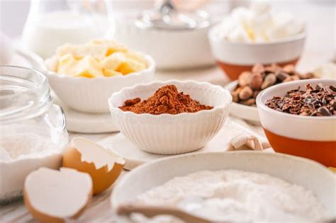 Organic Cacao Butter And Baking Ingredients With Kitchen Utensils Stock