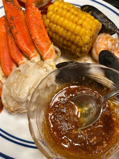 Juicy Crab Seafood Boil With Cajun Garlic Butter Sauce The Tasty Bite