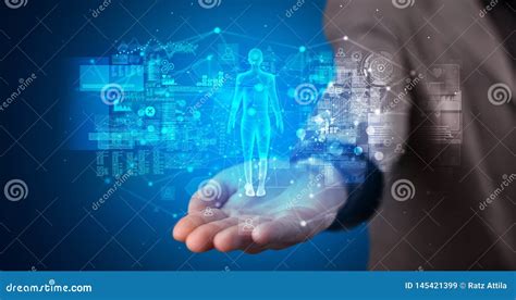 Young Person Holding Hologram Projection With Health Concept Stock