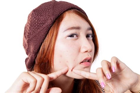 Premium Photo Teenage Girl Squeezing Her Pimple On Studio