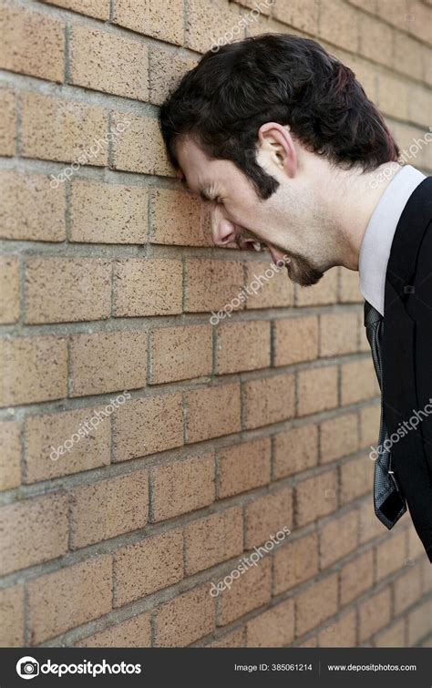 Businessman Banging His Head Wall Stock Photo By Image Hit 385061214