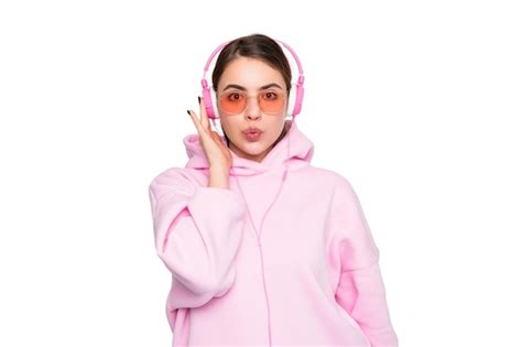 Premium Photo Girl In Casual Pink Hoodie And Glasses Listening To