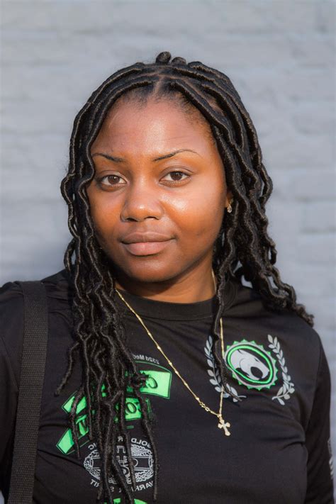 Human Portrait Photography Of Woman Wearing Black Shirt And Gold