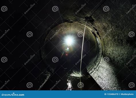 Dirty Drainage System Tube On Facade Of The Building Water Drain From