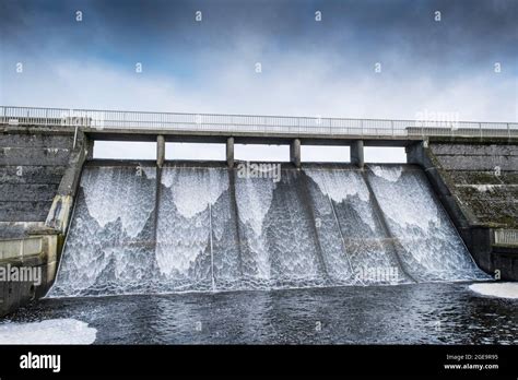 Water Flowing Down The Overflow Spillway Of Crowdy Reservoir On Bodmin