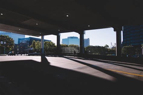 Premium Photo Sunlight Falling On Parking Lot In City