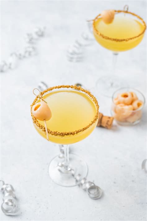 New Years Golden Tiki Cocktail Gold Rum Lychee Champagne Cocktail