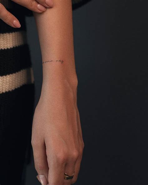 Somos Una Vez Lettering Tattoo Handwritten On The