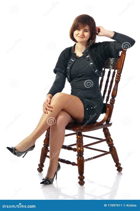 Sitting Girl Looking Over Shoulder Stock Image