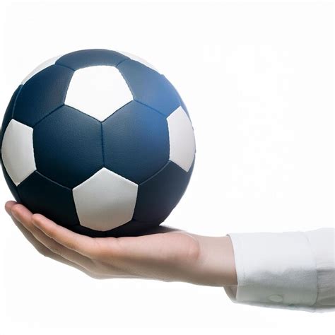 Premium Vector A Person Holds A Soccer Ball In Their Hand