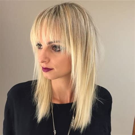 Platinum Face Framing Cut With Textured Ends And Full Brow Skimming