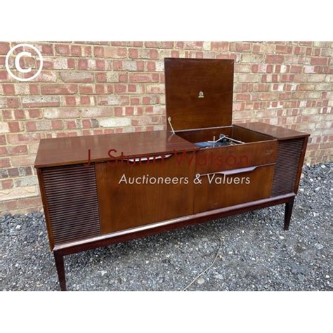 A Mid Century Teak Radiogram Fitted With A Garrard Record De Barnebys