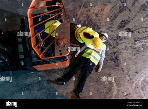 asian worker do cardiopulmonary resuscitation cpr after warehouse