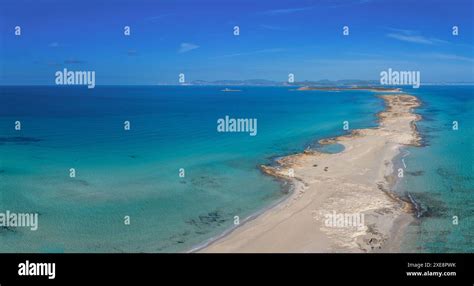 Aerial View Of The Platja De Ses Illetes Beach And Isthmus In Northern