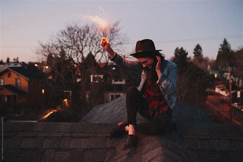 Rooftop With Sparklers By Stocksy Contributor Luke Mallory Leasure