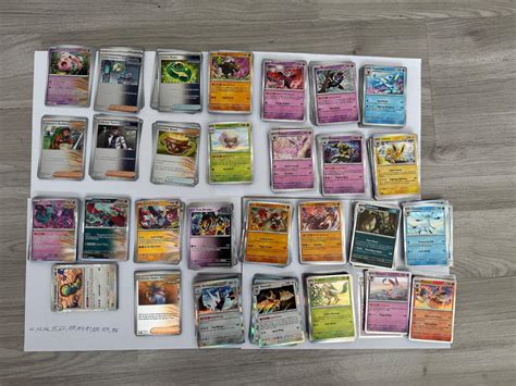 Pokemon prismatic evolutions holo ancient future dle výběru Aukro