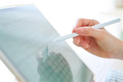 Premium Photo Womans Hand Holding A Stylus Pen