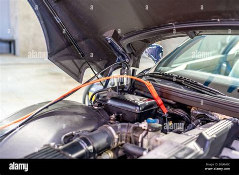 Charging The Car Battery Using Electric Cables Stock Photo Alamy