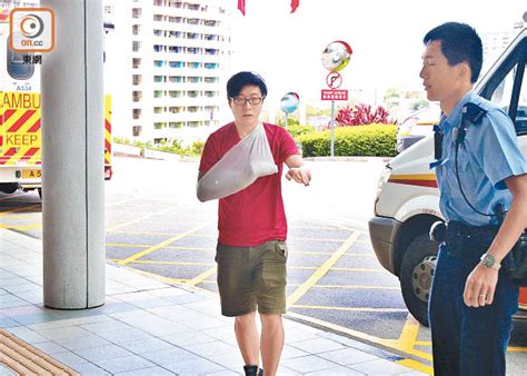 拯救夾手女工 男子仆倒俱傷 東方日報