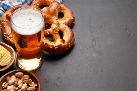 Premium Photo Lager Beer Nuts Potato Chips And Fresh Homemade Pretzel