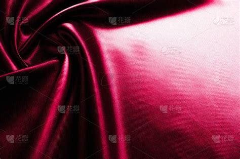 纹理 背景 图案。红色丝绸织品。这缎面料是完美的 使织物的花朵 用于头发配件 Jewery