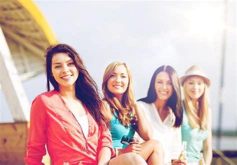 Premium Photo Summer Holidays And Vacation Girls With Drinks On The