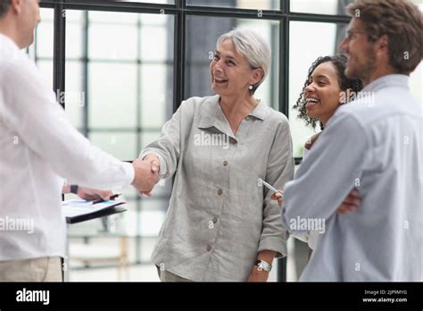 Conversation Between Managers And Employees In The Office Stock Photo
