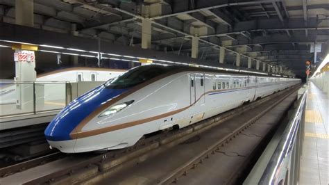 2023年12月17日北陸新幹線金沢 駅 13番のりば 12番のりば側から 728eつるぎ728号富山行き停車中→発車 E7系f9編成運行
