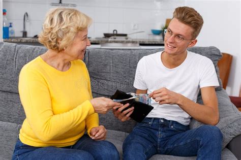Guy Giving Money His Elderly Mother Stock Image Image Of Woman Care