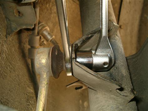Use A 16 Mm Open End Wrench As A Counterhold And A 16 Mm Socket And A