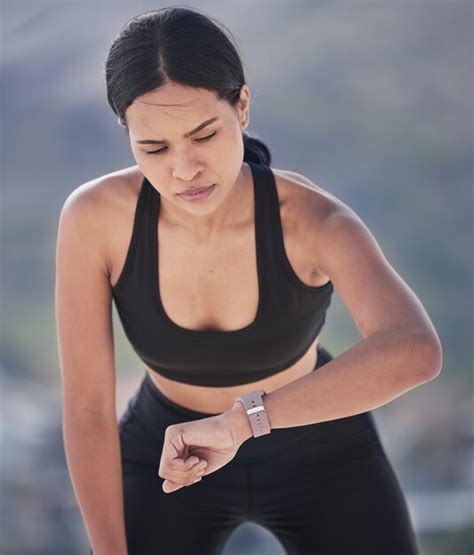Premium Photo Running Woman And Check Smart Watch Outdoor For Time Heart Rate And Fitness