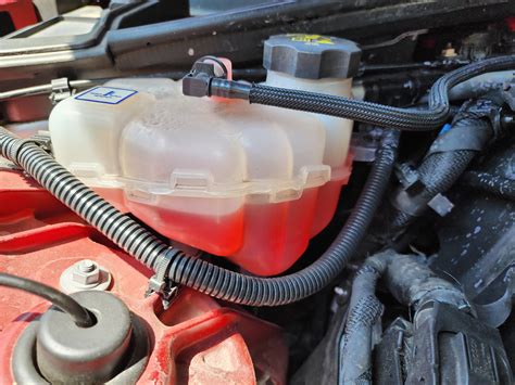 Coolant overflowing, no heat, engine not overheating. Other issues ...
