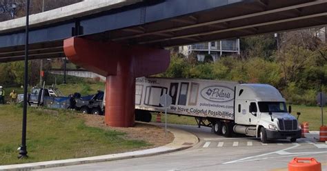 Car Strikes Building Semi Stuck Under Bridge