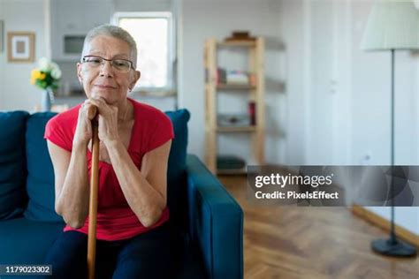 Woman Using Cane Photos And Premium High Res Pictures Getty Images