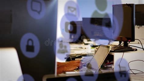 Animation Of Icons And Computer Language Over Caucasian Man Typing On