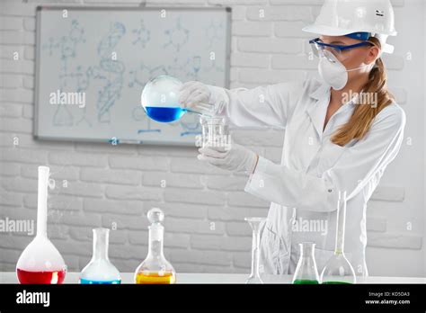 Shot Of A Female Scientist Working With Sample Liquids At Her Laboratory Stock Photo Alamy