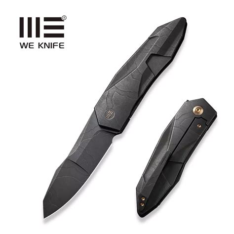 We Knife Solid Black Stonewashed Etching Pattern Titanium Black